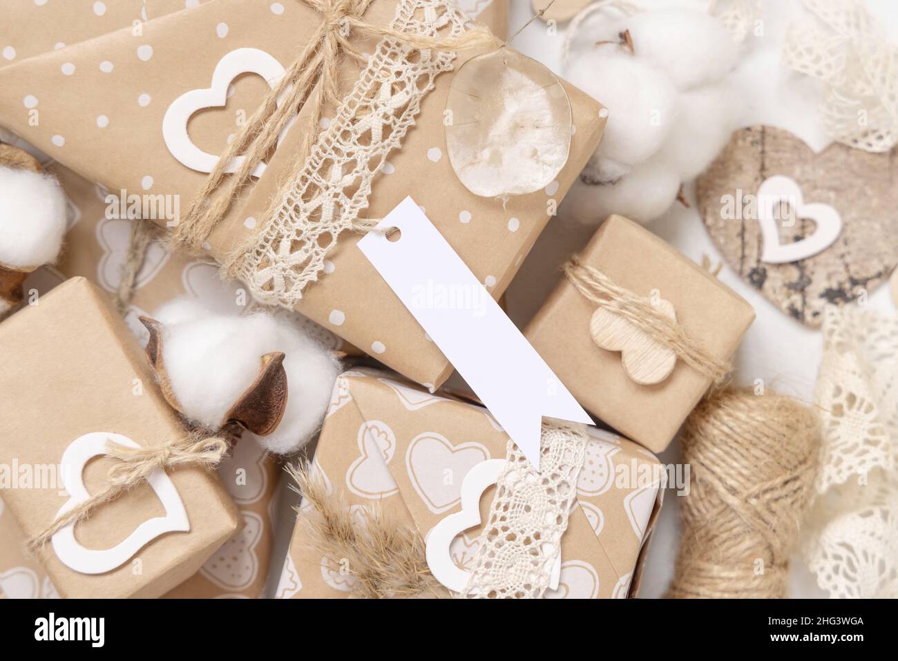 Valentines present with gift tag, heart and pampas grass close up ...