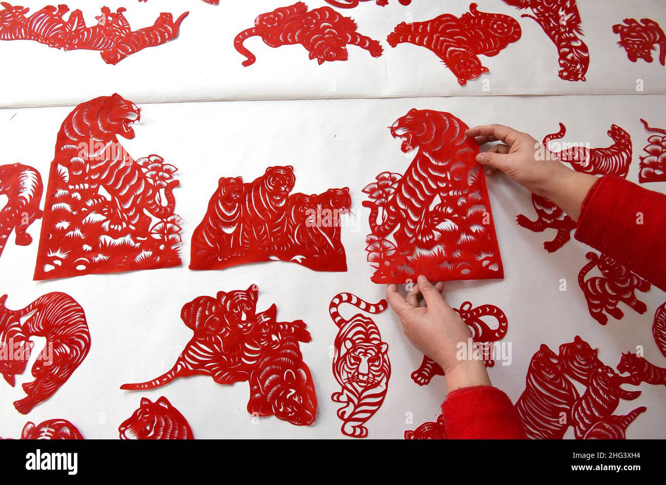 HANDAN, CHINA - JANUARY 18, 2022 - A piece of paper cutting created by ...