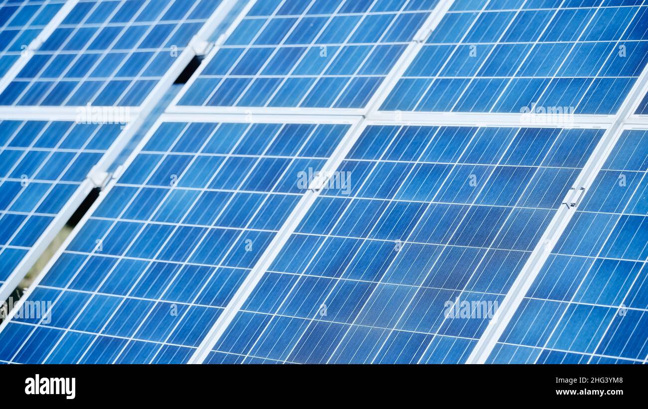 blue construction of solar batteries outside Stock Photo - Alamy