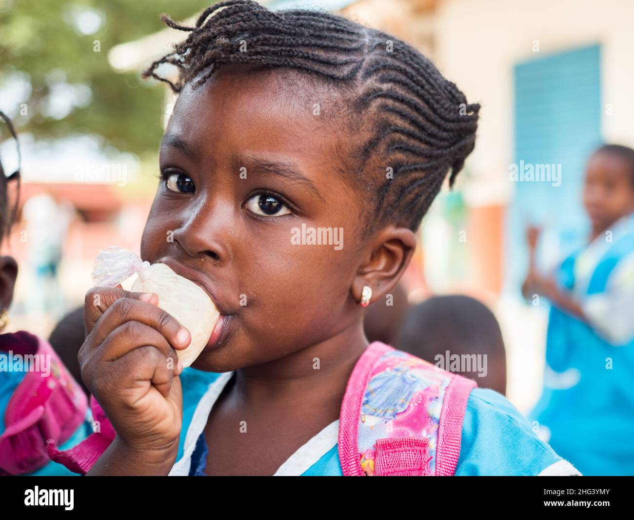 Senegal, Africa - January, 2019: Portrait of a small black girl in the ...