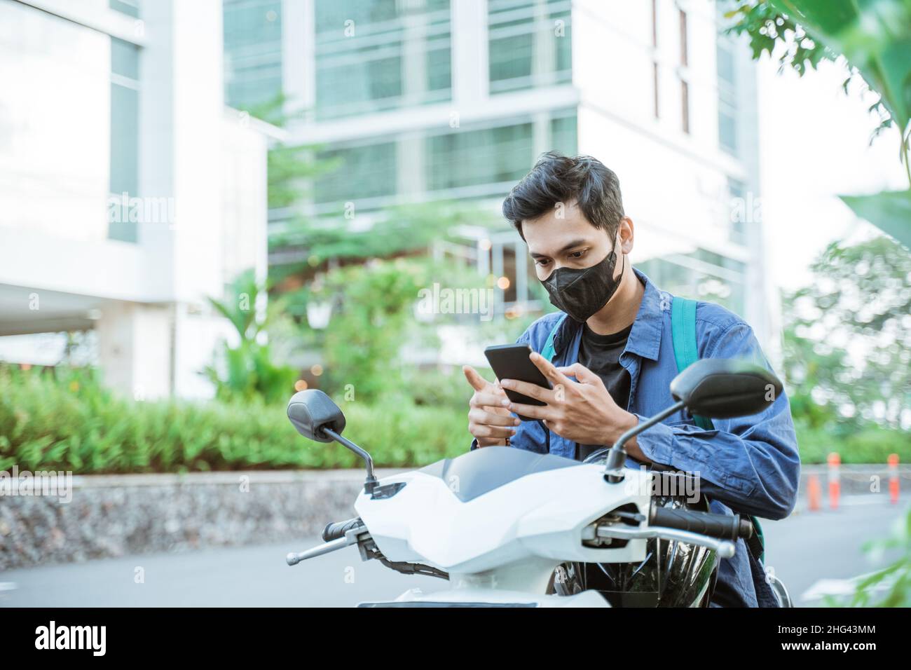 Young people working motorcycle hi-res stock photography and images - Alamy