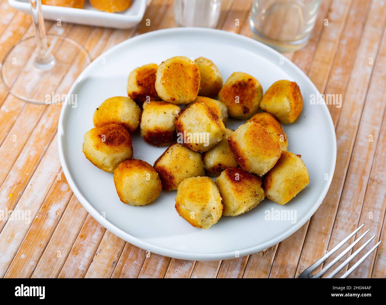 Fried cheese croquettes with crispy crust and soft filling Stock Photo ...