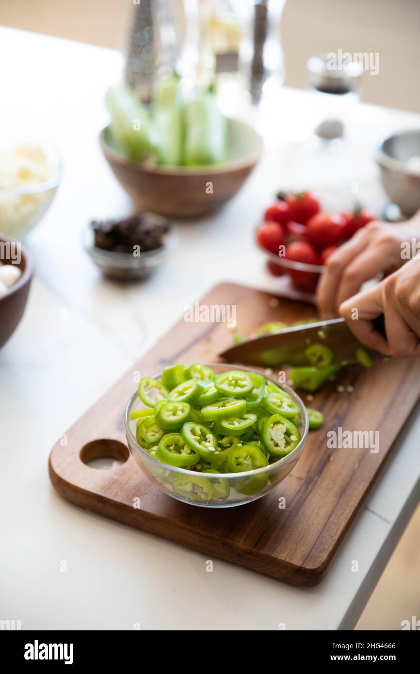 Pepper cutting, woman chopping pepper on cutting board, top view Stock ...