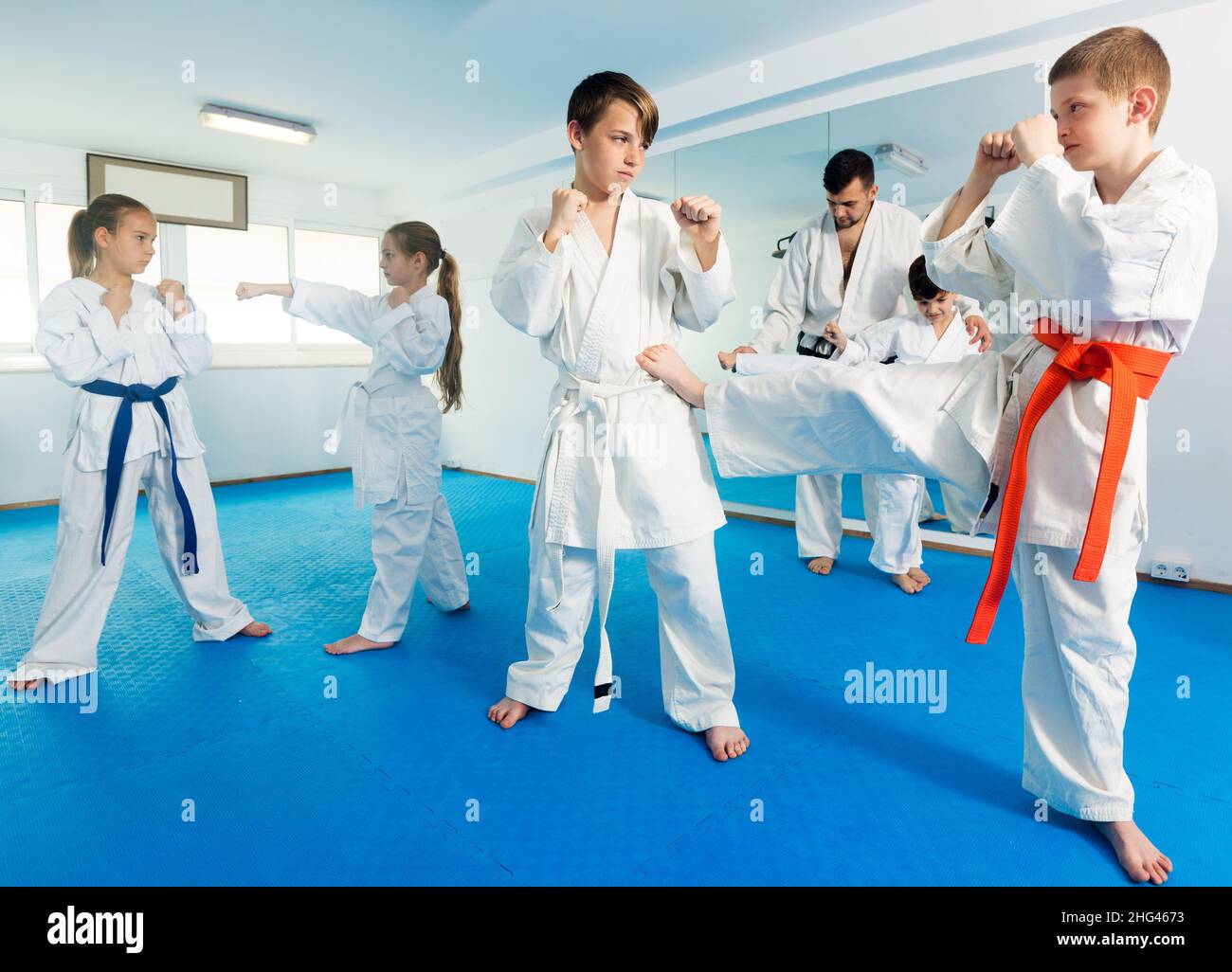 Children training in pairs Stock Photo - Alamy