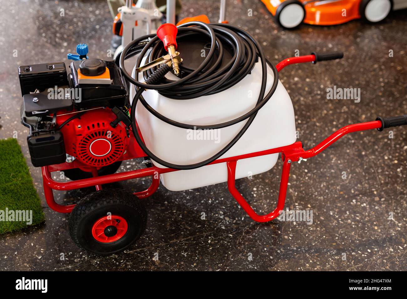 Petrol engine in gardening tools store Stock Photo - Alamy