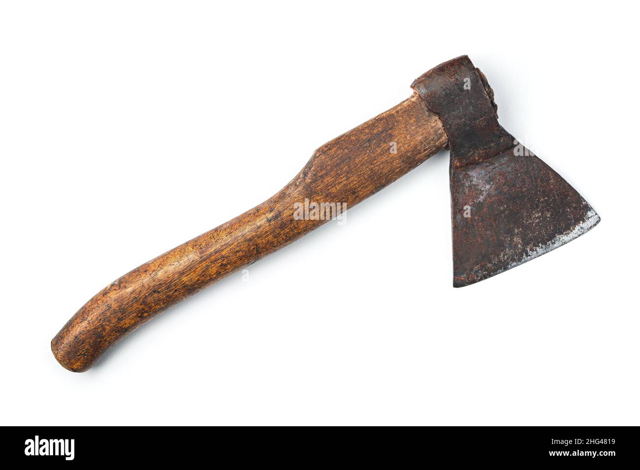 A rusty, old axe with a wooden handle is isolated on a white background ...