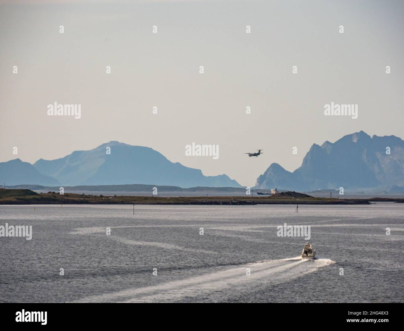 Bodo, Norway - August 18, 2019: Mountain landscape, boat on the water ...