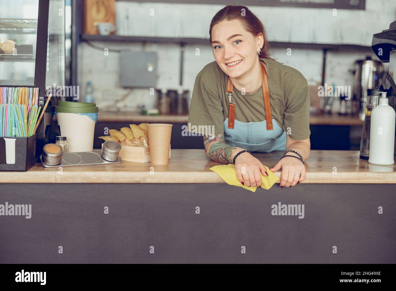Bartender behind counter in hi-res stock photography and images - Alamy