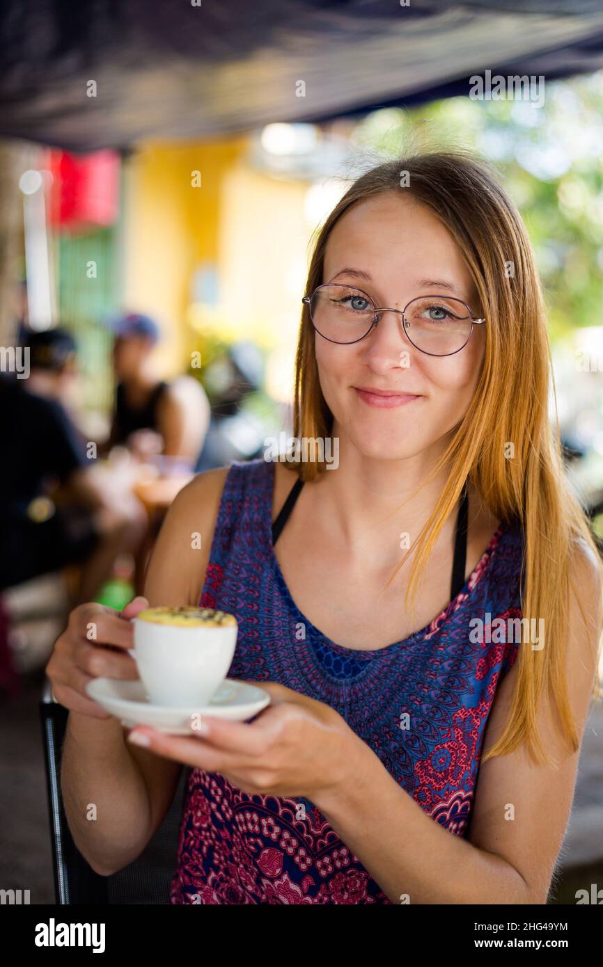 Beautiful woman with a Cup of traditional vietnamese egg coffeePicture ...