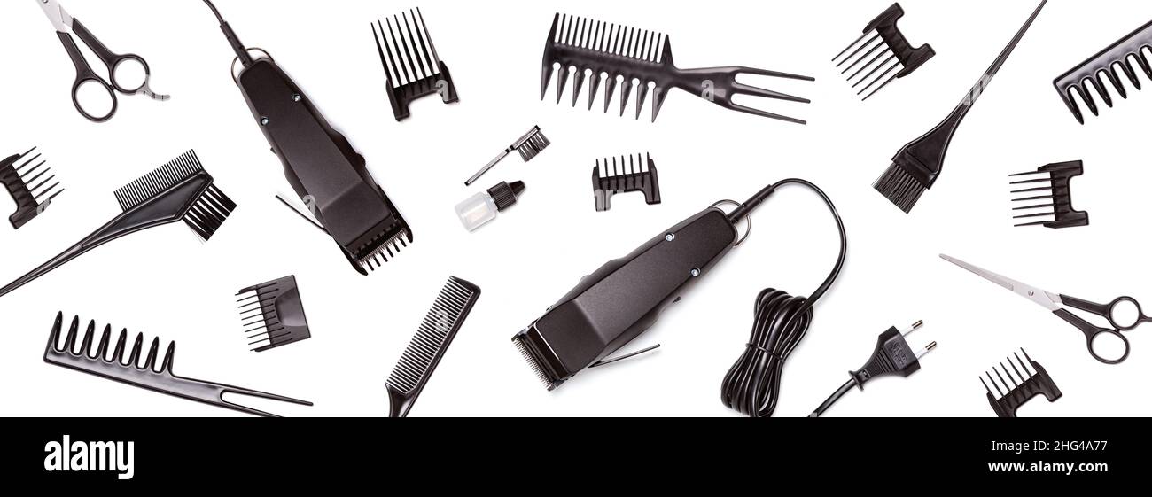 Professional hair clippers with set of nozzles of different sizes ...