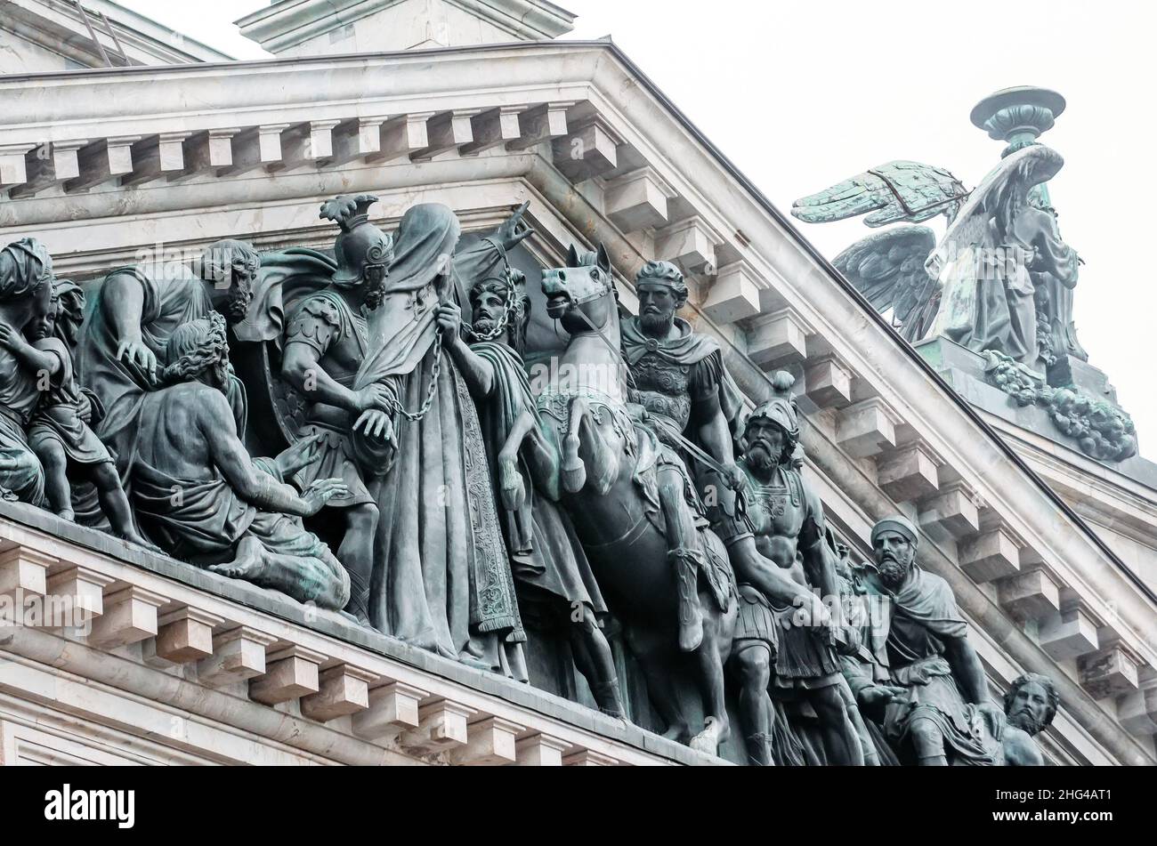 View of the ancient statues of stucco and the dome of St. Isaac's ...