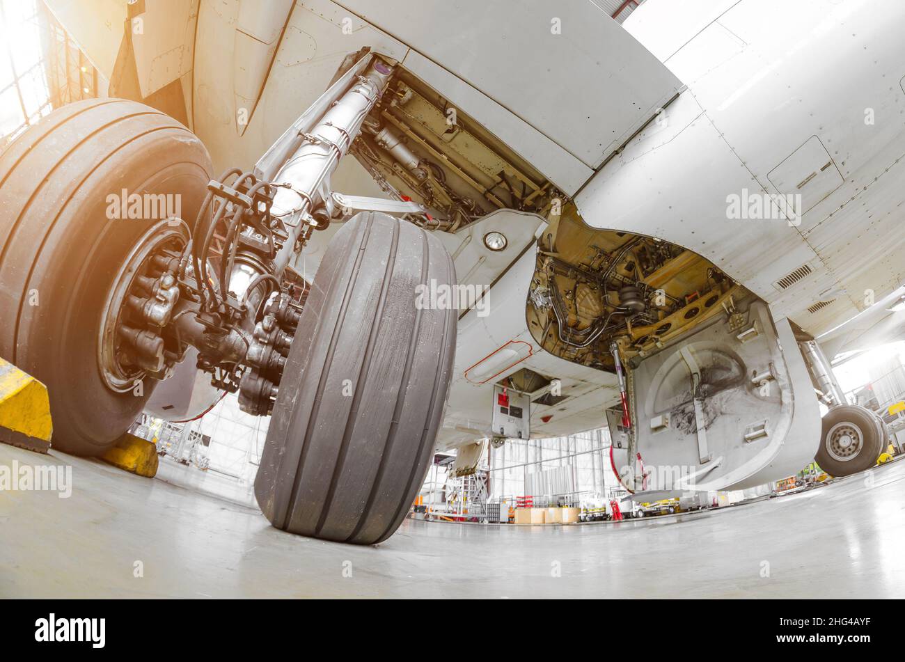 Landing gear airplane in hangar chassis rubber close-up Stock Photo - Alamy