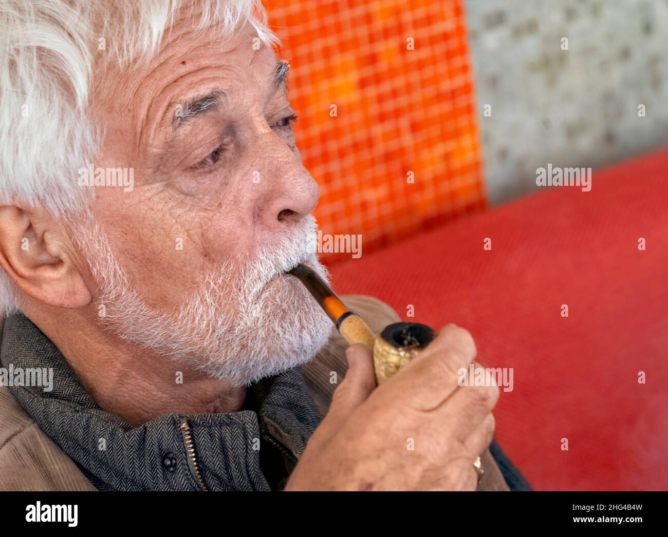 Man smoking a pipe Stock Photo - Alamy