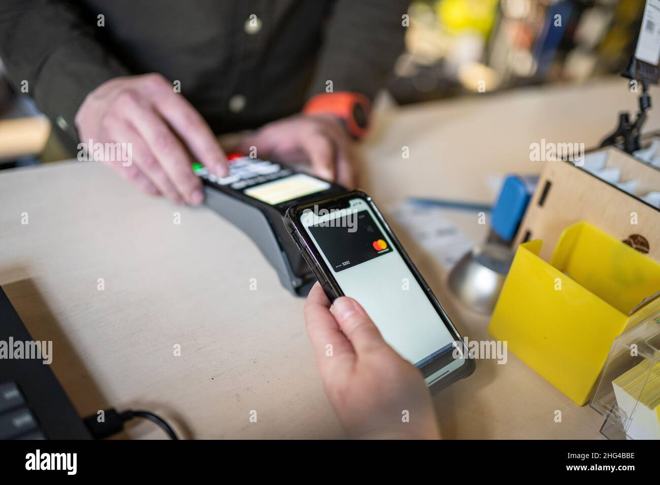 Woman paying smartphone via hi-res stock photography and images - Alamy