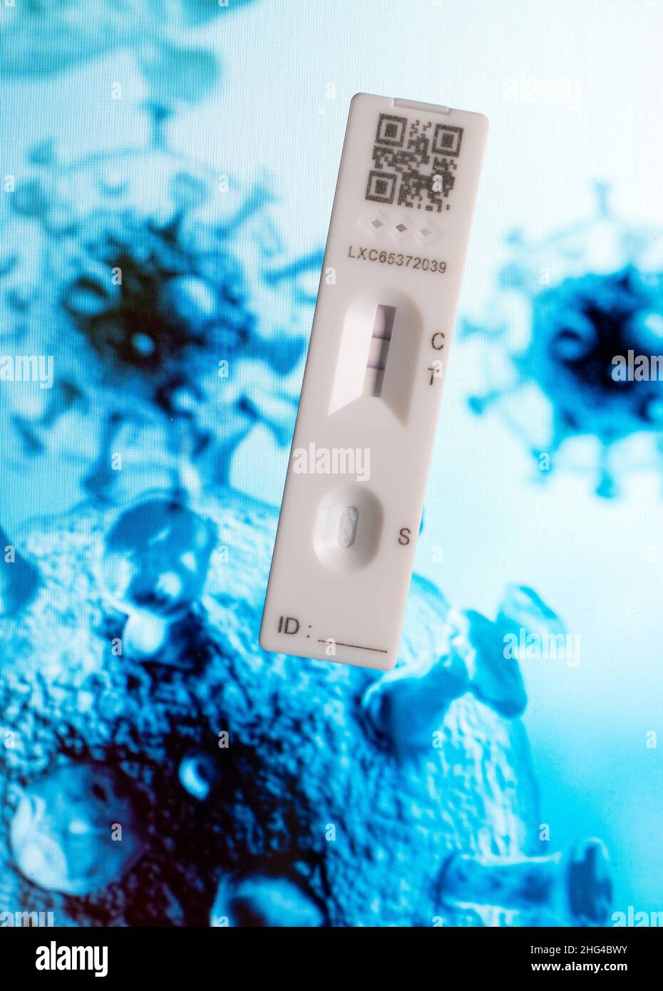 A Covid-19 rapid antigen test (lateral flow self test) showing a ...