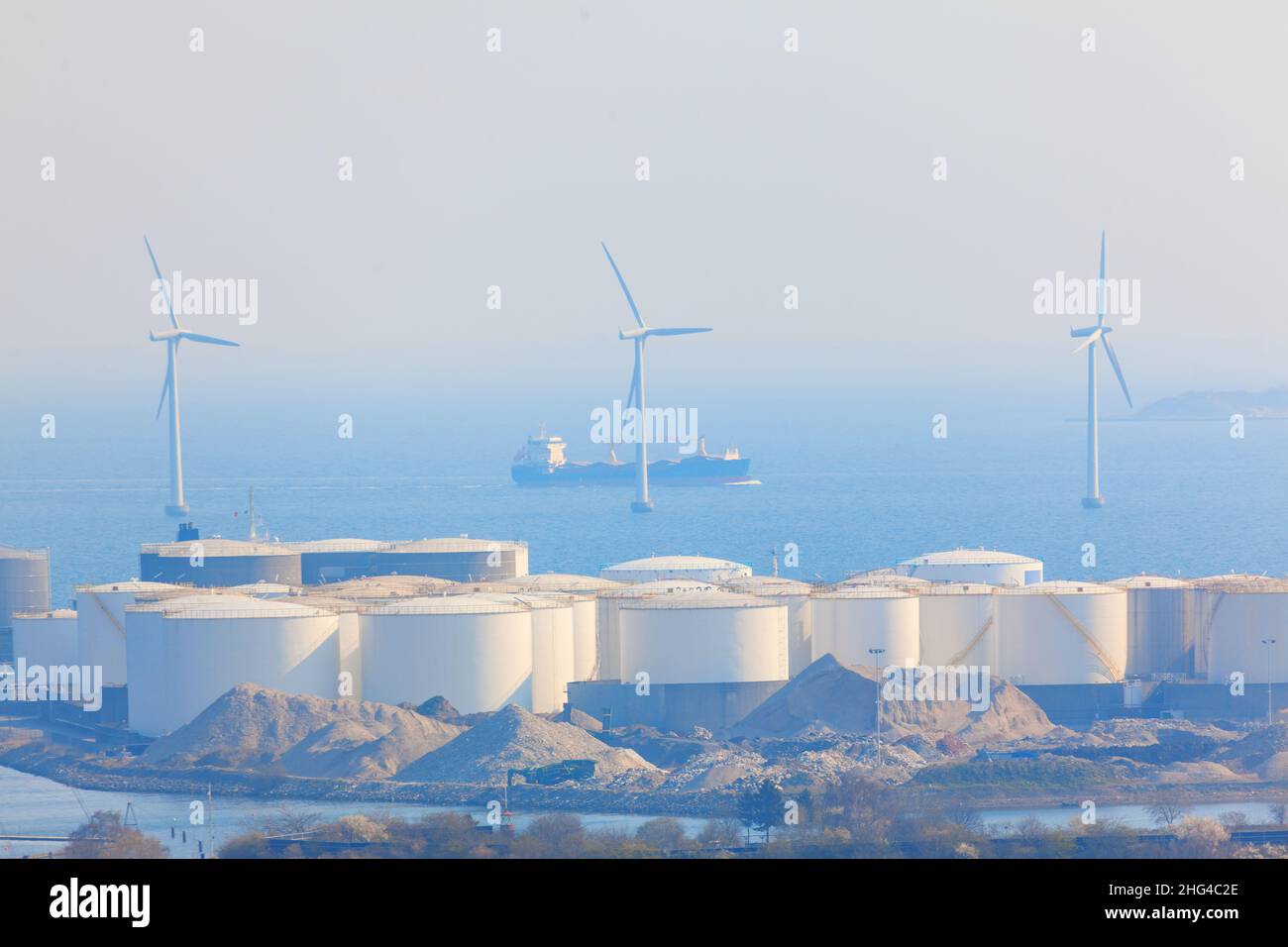 Petroleum Storage in Copenhagen . Coastal tanks with oil . Windmill ...