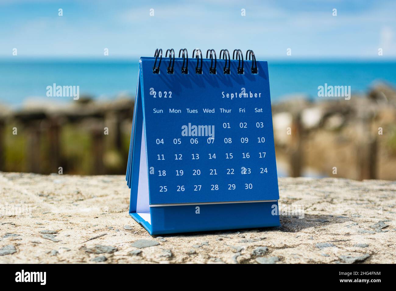 Blue September 2022 calendar on blurred background of blue ocean. 2022 ...