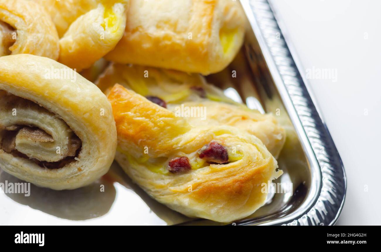 Set of various traditional pastry sweet mini Danish on the silver tray ...