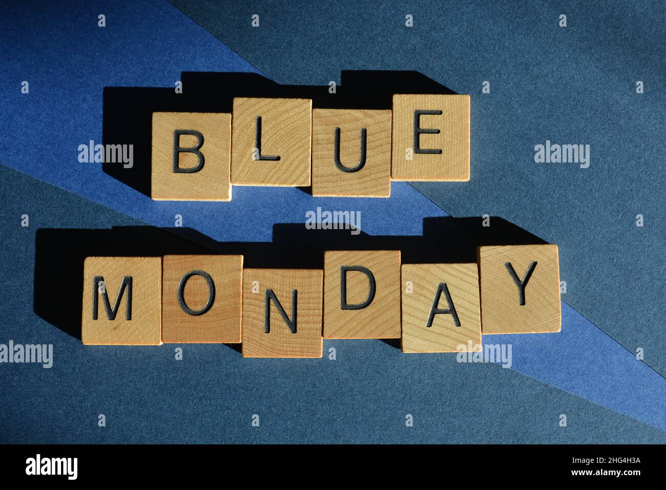 Blue Monday, words in wooden alphabet letters isolated on blue ...