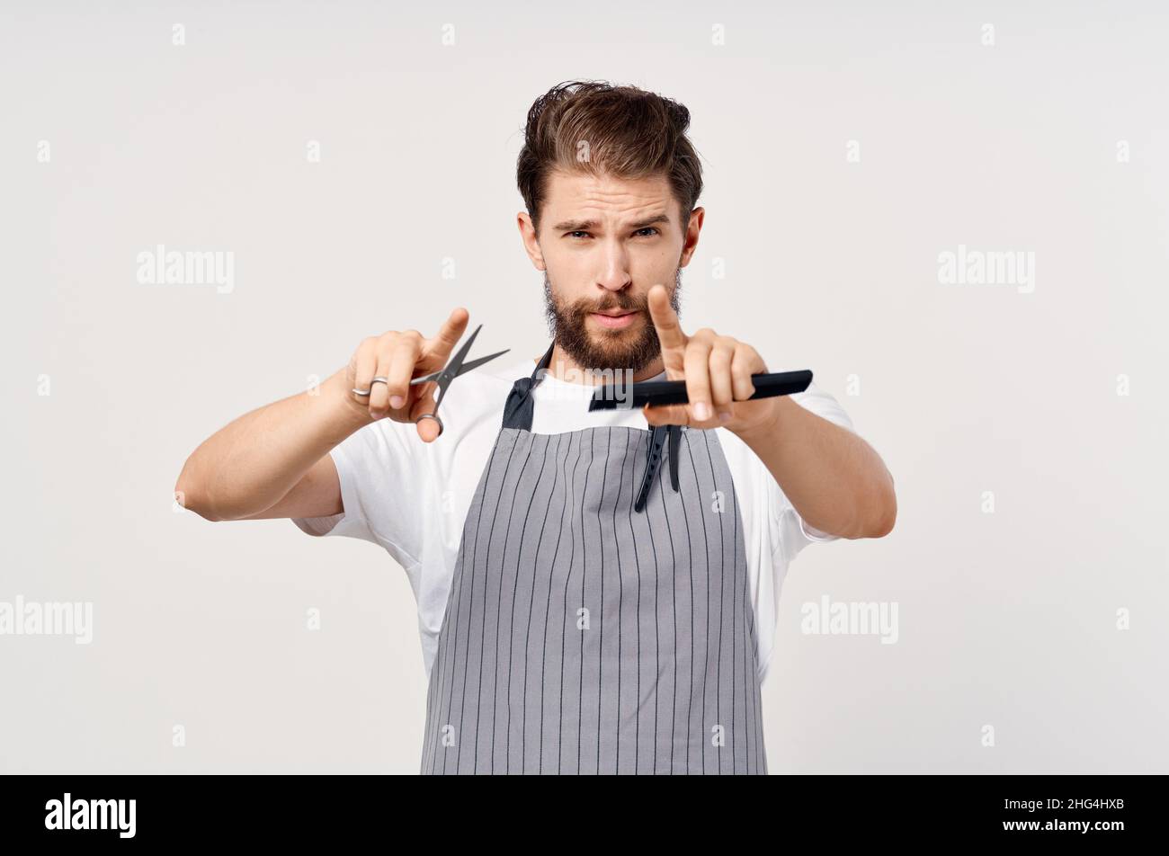 barbershop man gray apron comb scissors professional hairdresser ...