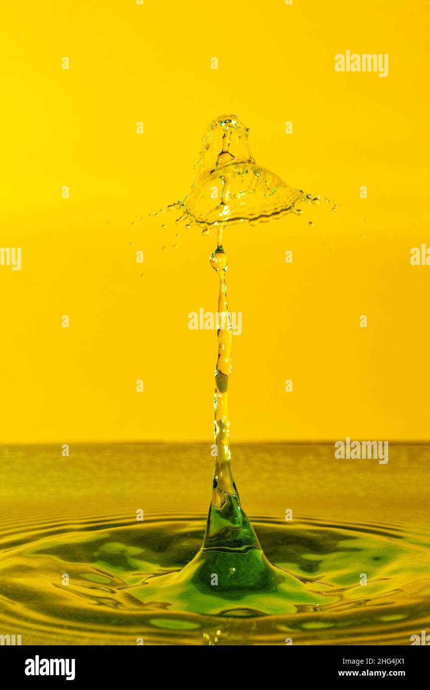 water drop splash on colorful background Stock Photo - Alamy