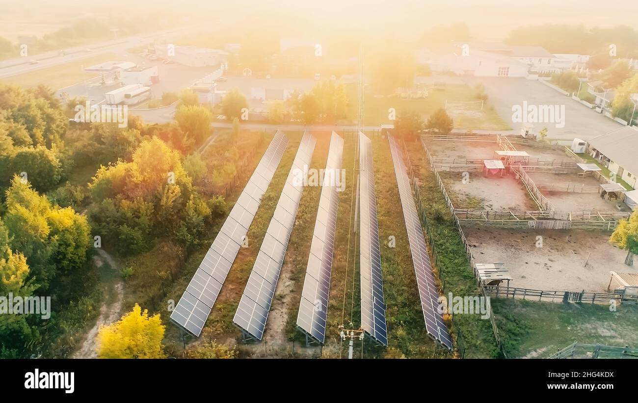 Aerial view of solar panels at sunset Stock Photo - Alamy