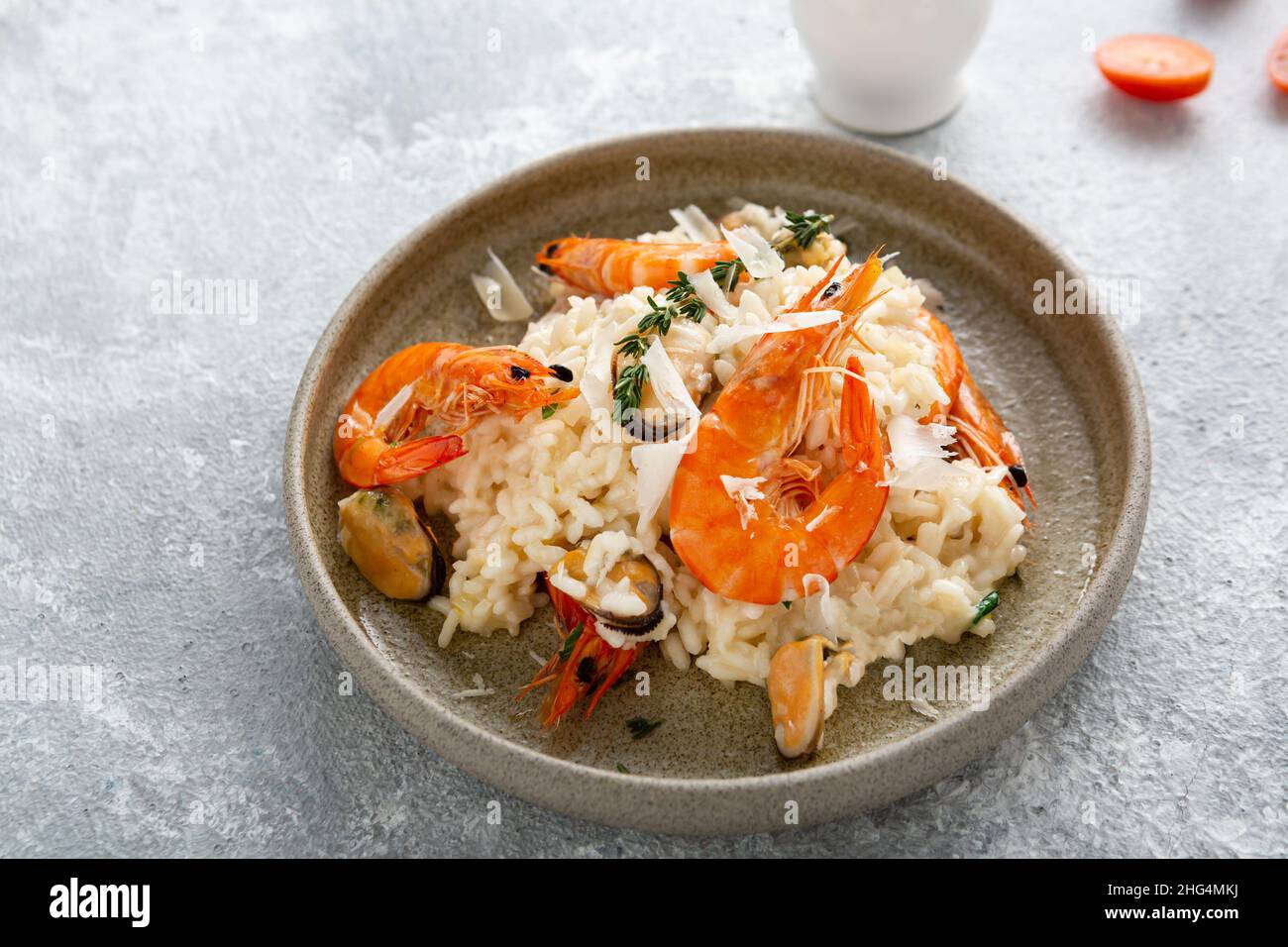Rice with seafood in bowl close up Stock Photo - Alamy