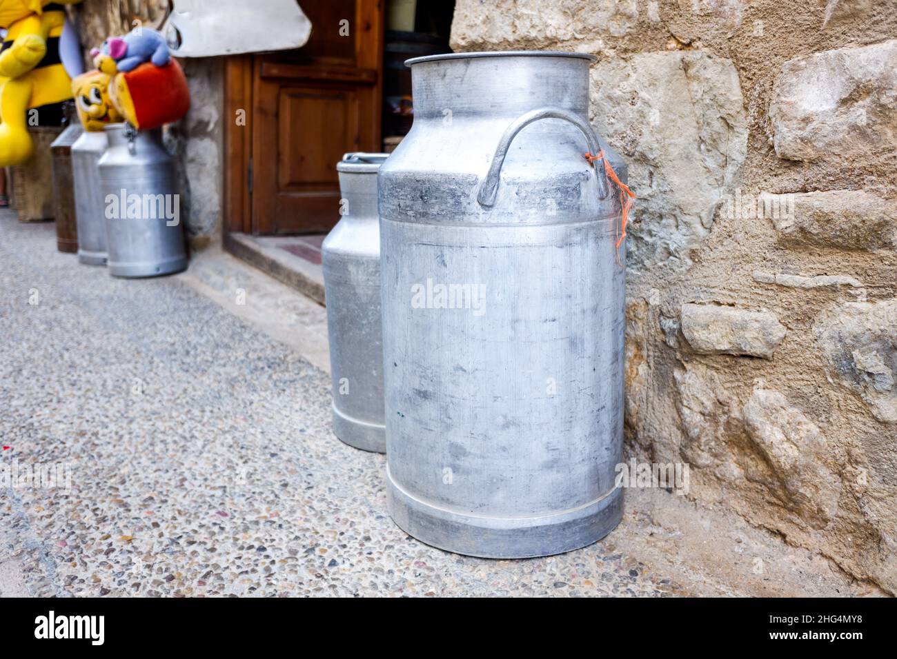Old farm milk containers hi-res stock photography and images - Alamy