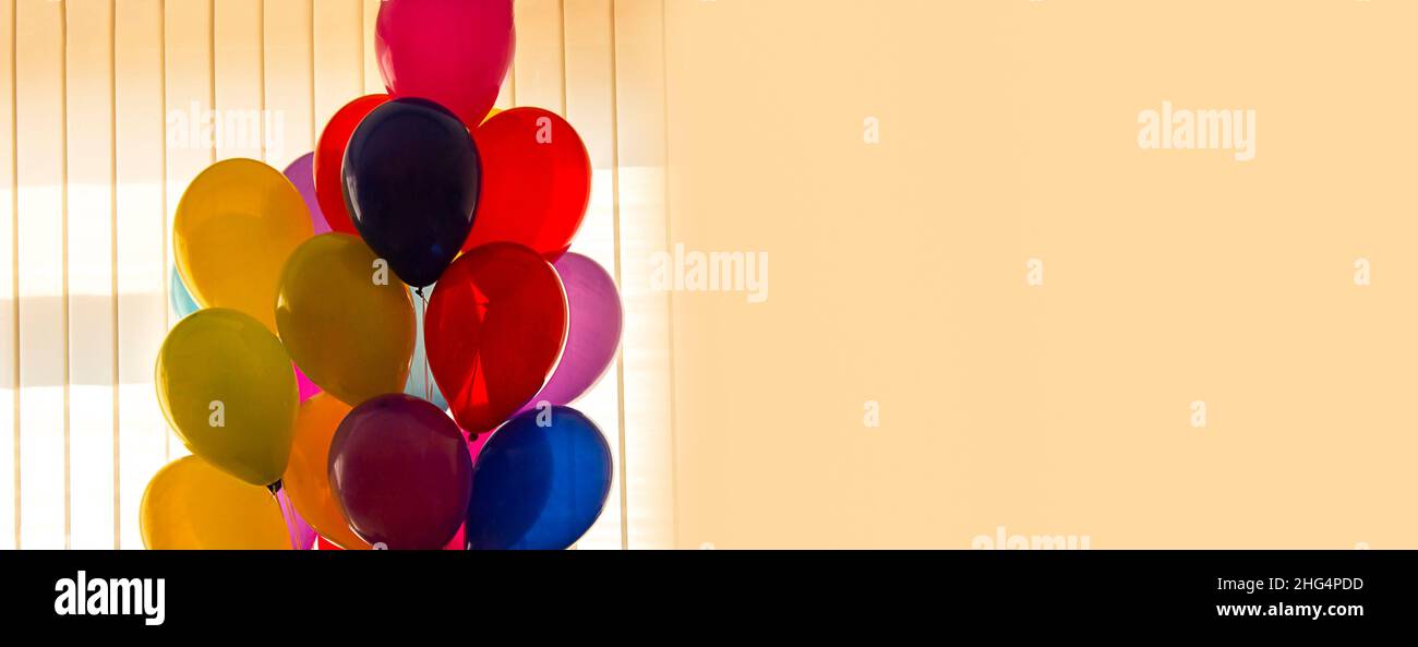 Bunch colorful balloons banner hi-res stock photography and images - Alamy