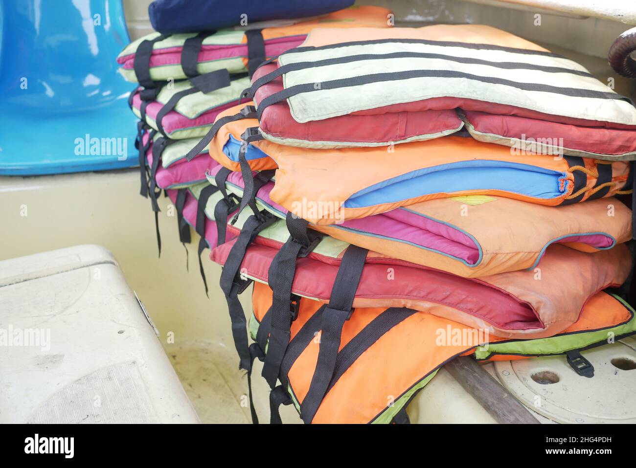 stack of life jacket in a boat Stock Photo - Alamy