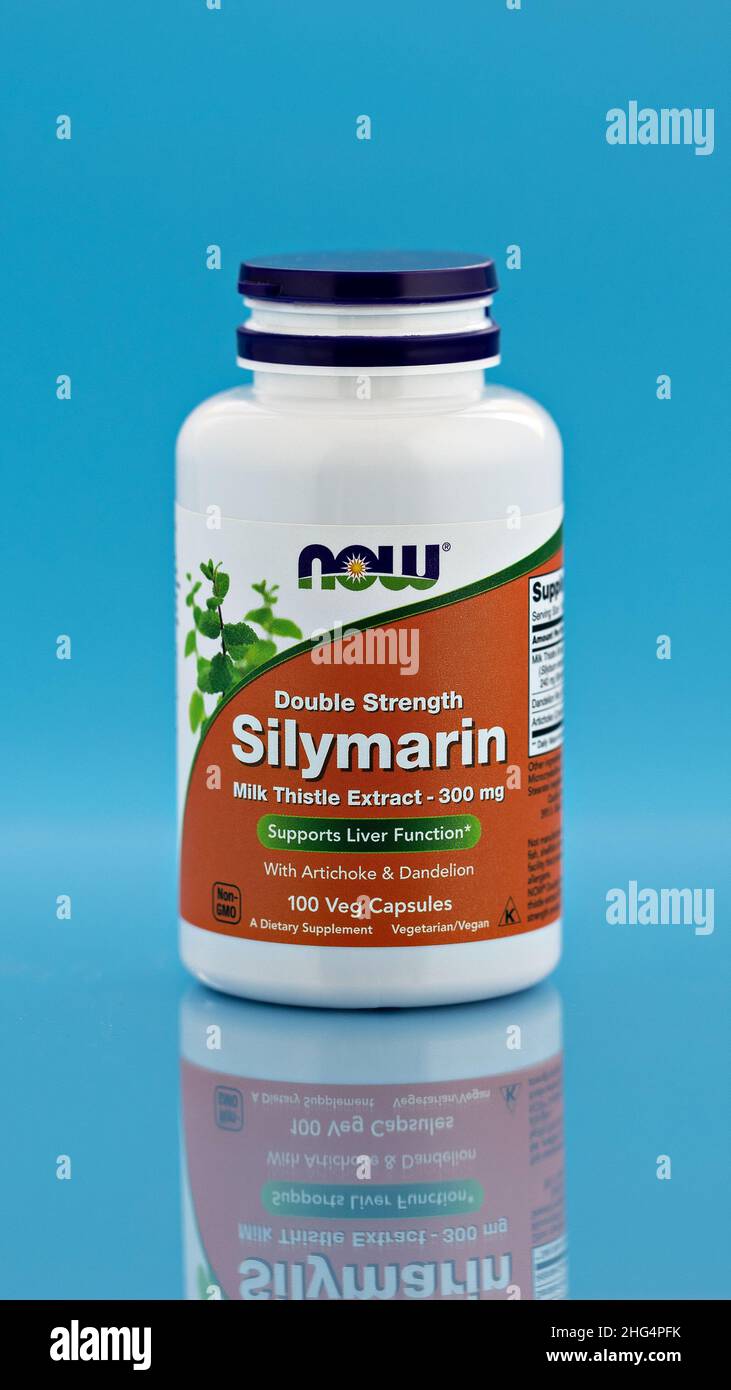 silymarin (milk thistle extract) capsules in the jar. dietary ...
