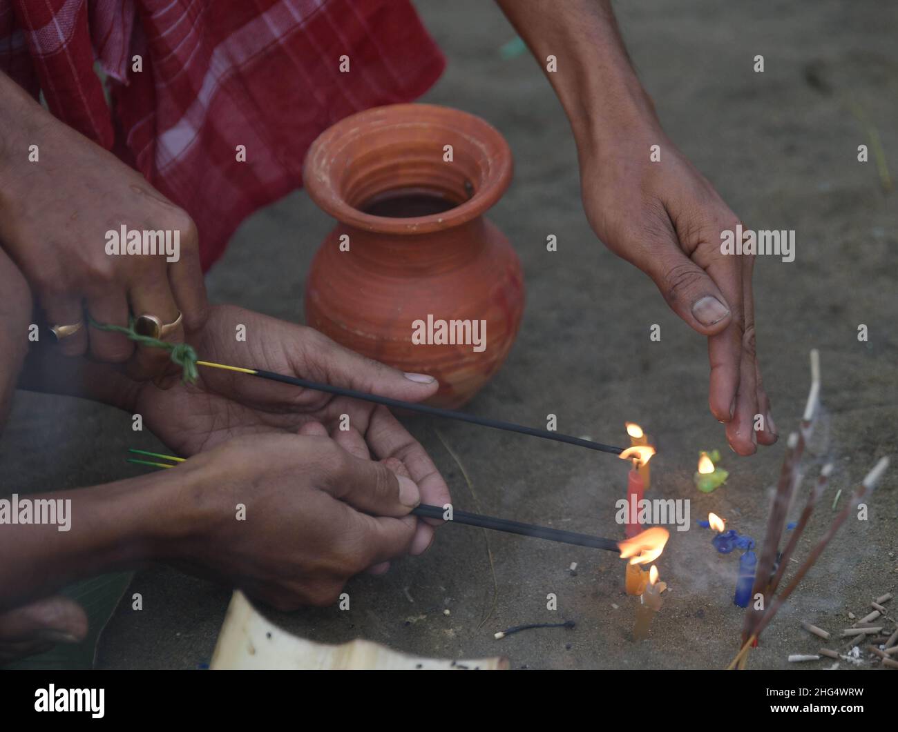 Bengali and Tribal Hindu devotees doing different rituals and praying ...
