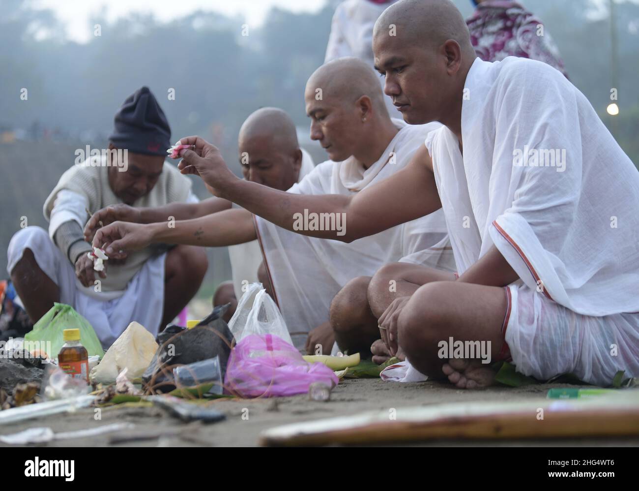 Bengali and Tribal Hindu devotees doing different rituals and praying ...