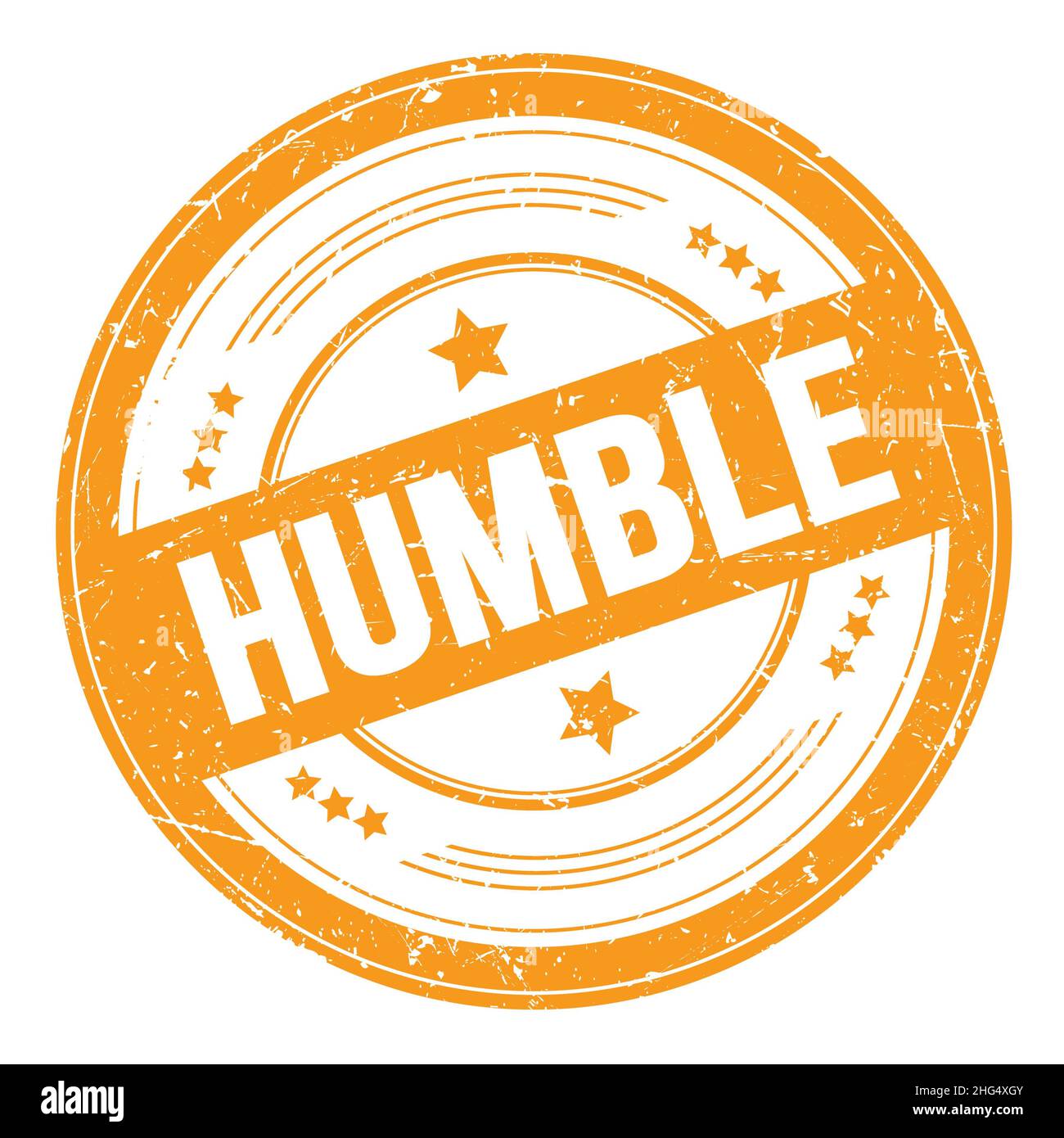HUMBLE text on orange round grungy texture stamp Stock Photo - Alamy