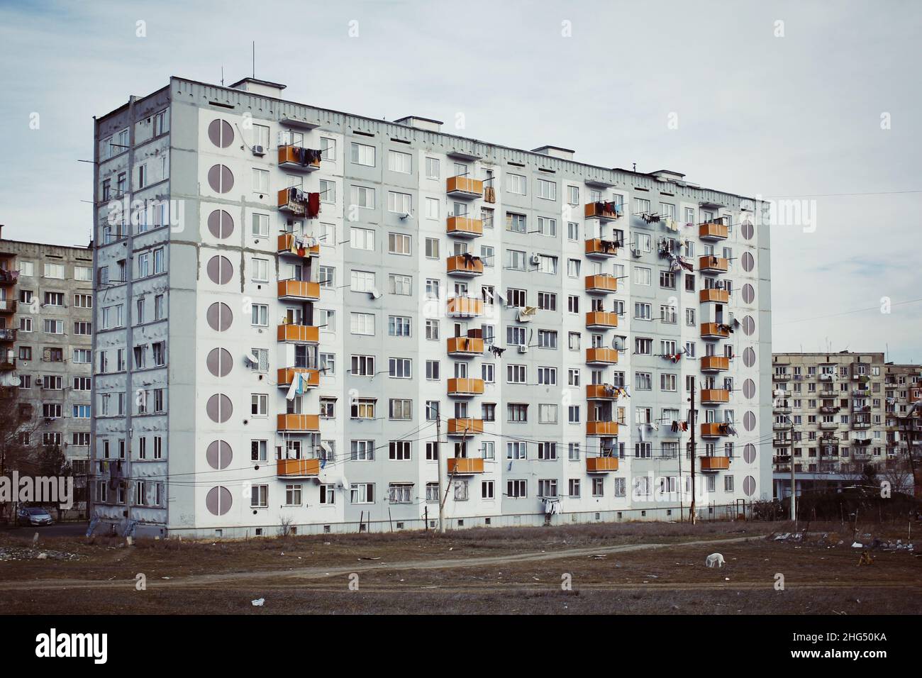 Ugly residential building. Multistory building in grey. Soviet ...