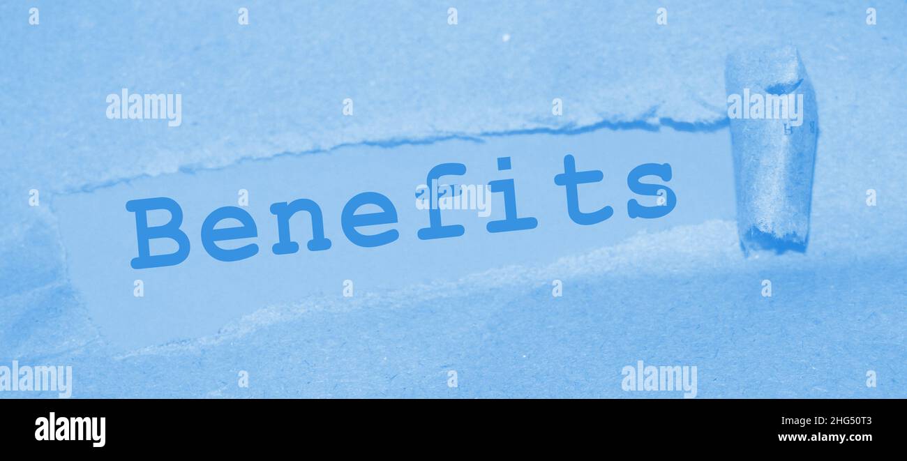 Benefits word appearing behind torn brown paper Stock Photo - Alamy