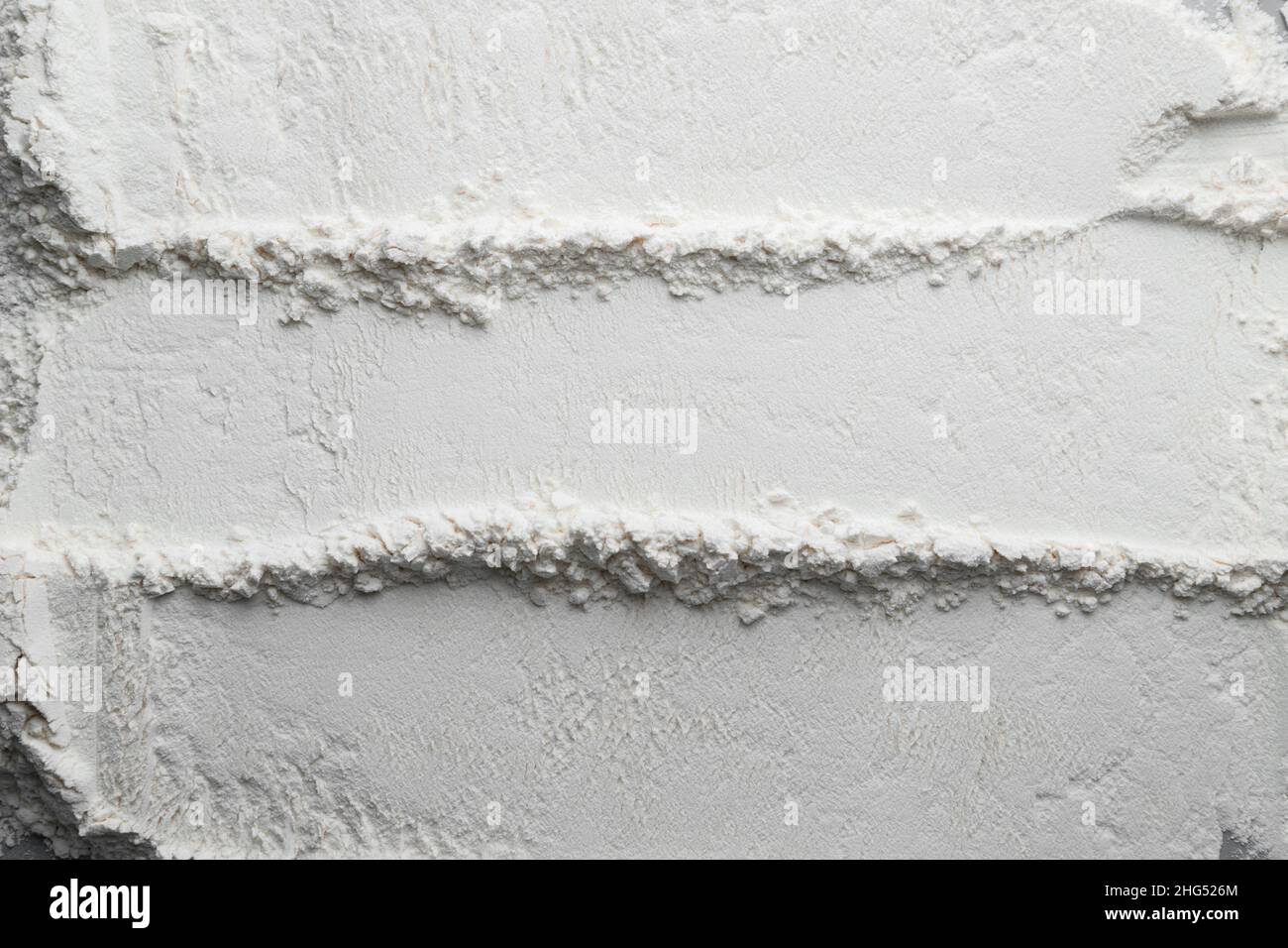 Flour or white powder background Stock Photo - Alamy