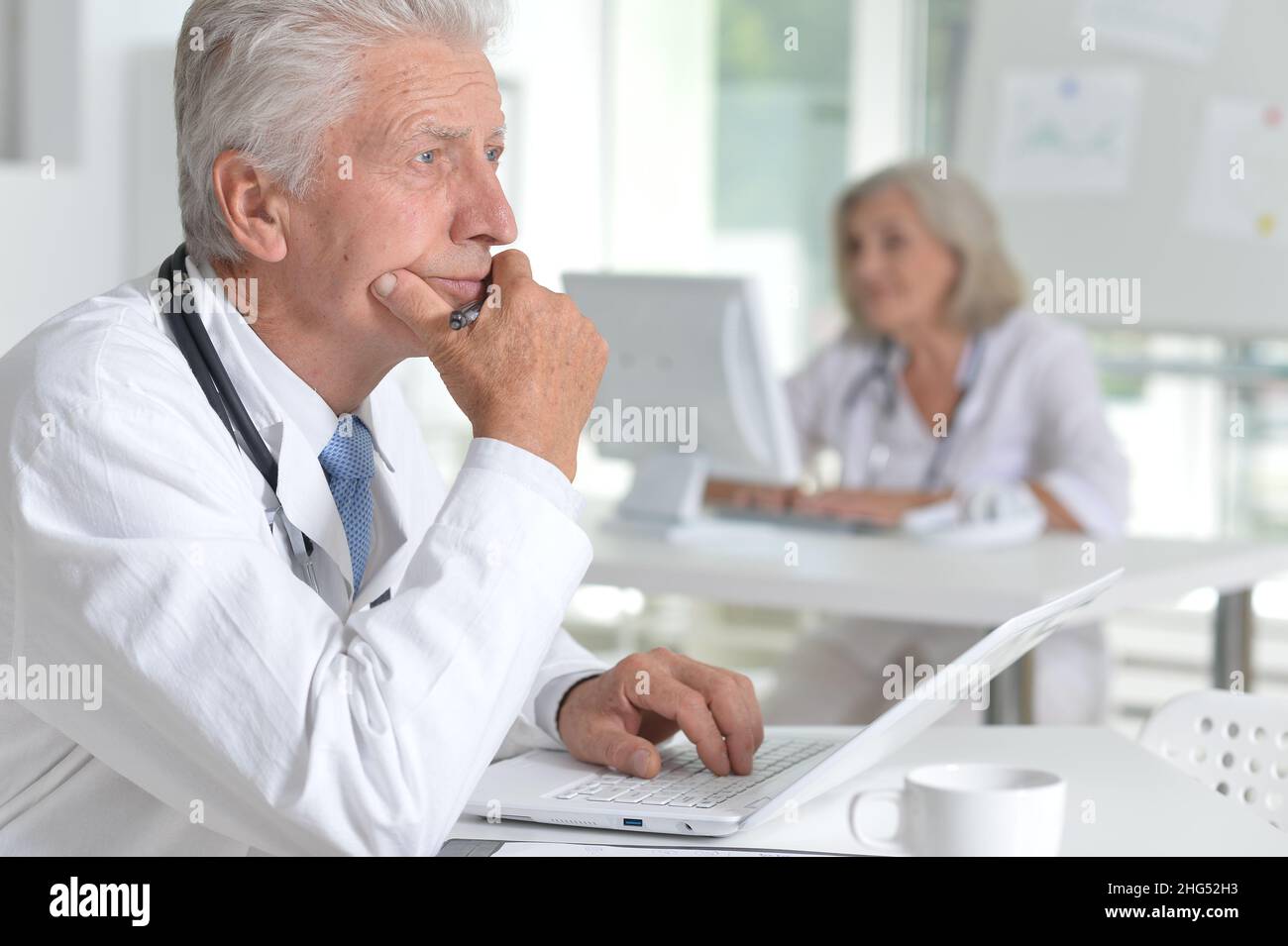 Professional doctor working in hi-res stock photography and images - Alamy