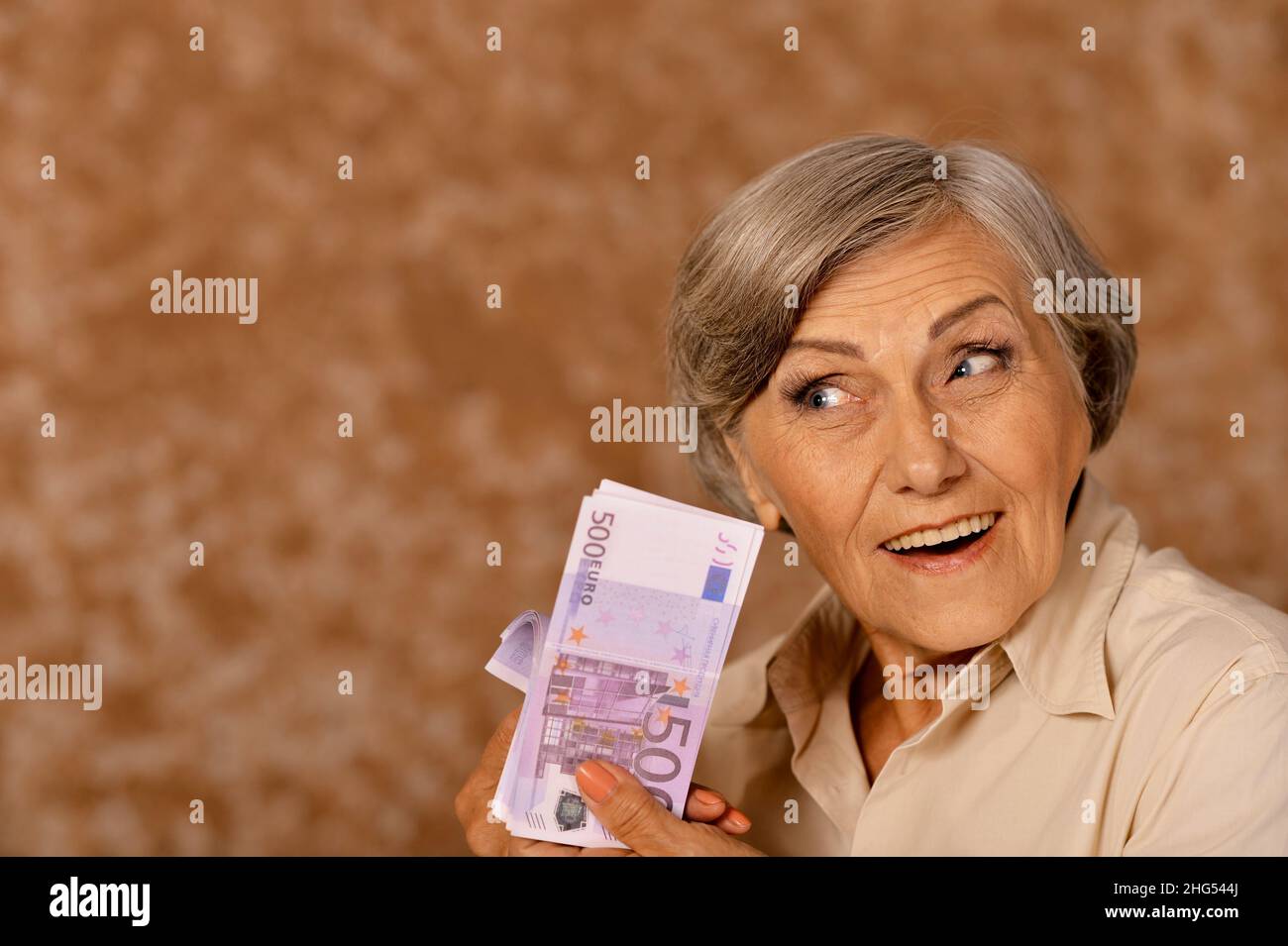 Surprise woman euros hi-res stock photography and images - Alamy