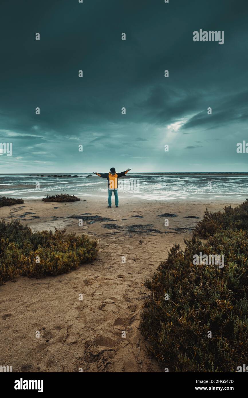 Concept of climate change for global warming people. Man standing ...