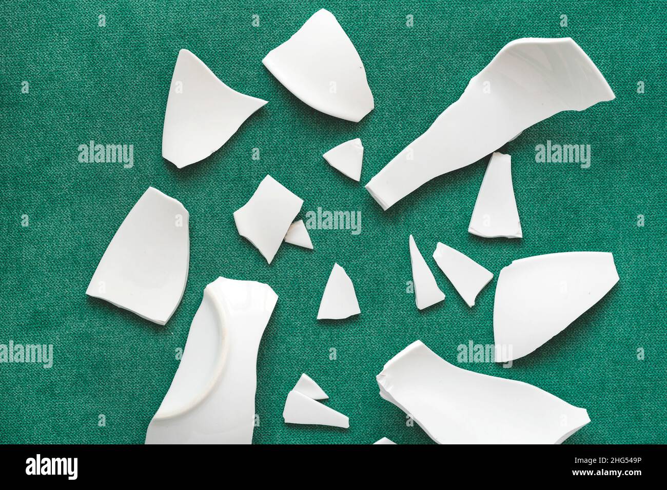 Splinters and Fragments of the broken white ware. Metaphor of a family ...