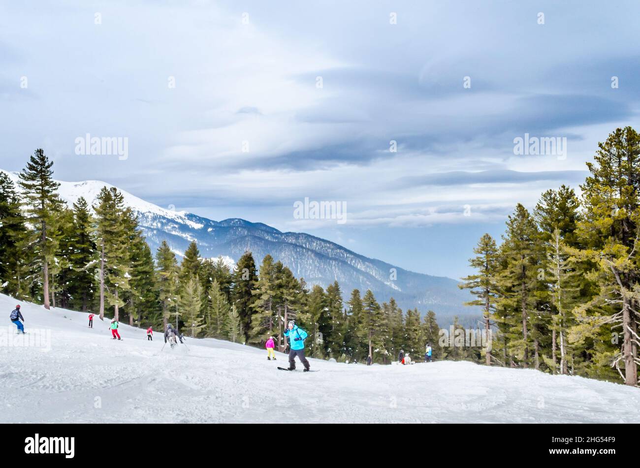 Winter Landscape with People Skiing and Snowboarding in Bansko Resort ...