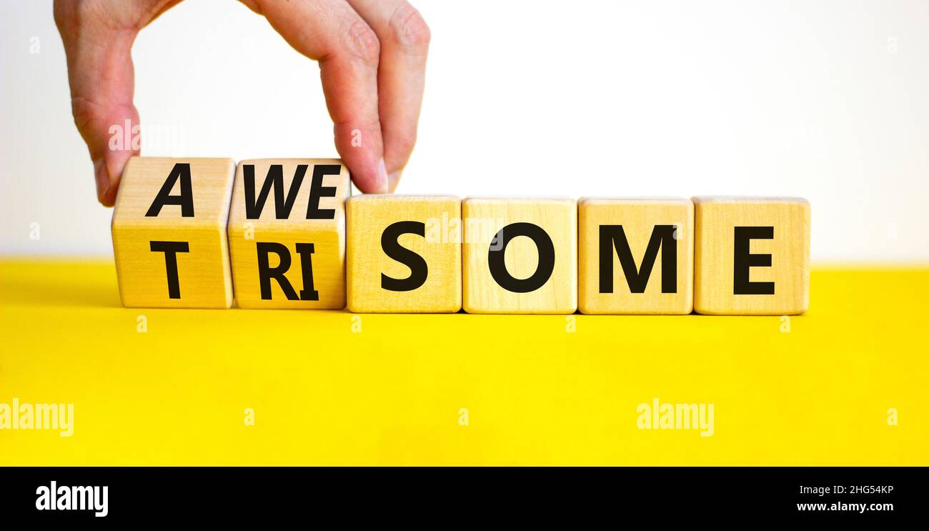 Awesome or trisome symbol. Doctor turns wooden cubes and changes the ...