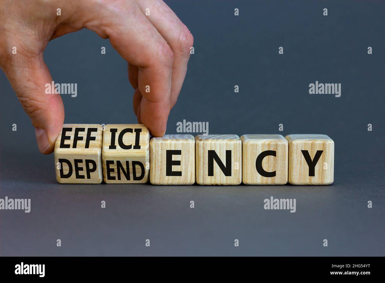 Efficiency or dependency symbol. Businessman turns cubes, changes the ...