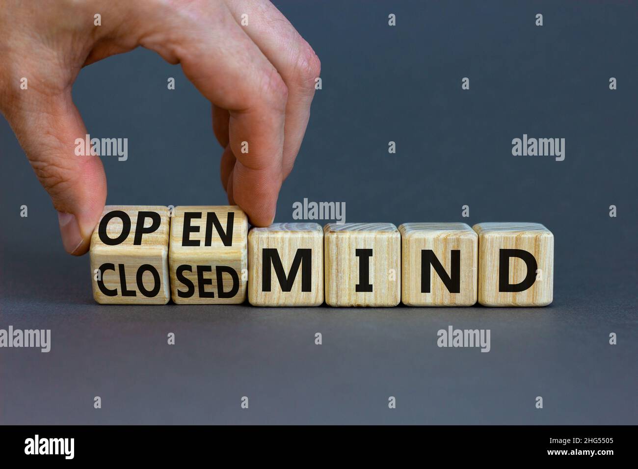 Open or closed mind symbol. Businessman turns cubes and changes concept ...
