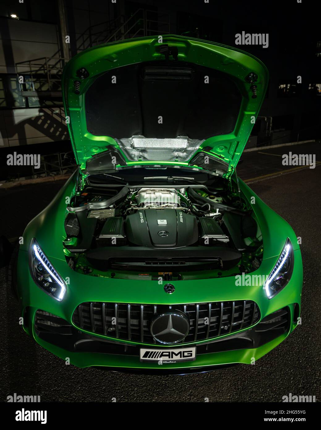 green Mercedes AMG GTR open bonet, engine, front Stock Photo - Alamy
