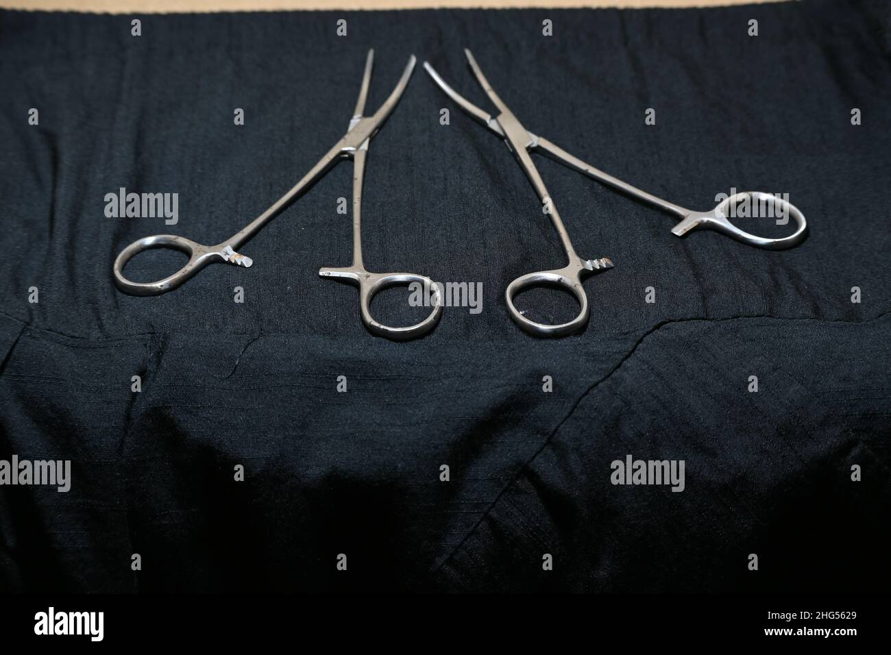 Artery forceps in open state Stock Photo - Alamy