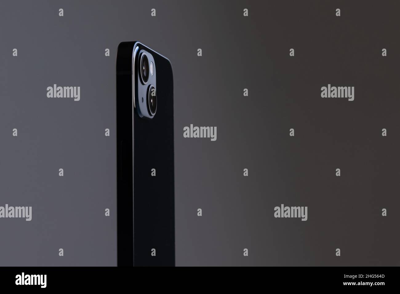 black modern thin rectangular smartphone with two large cameras at the ...