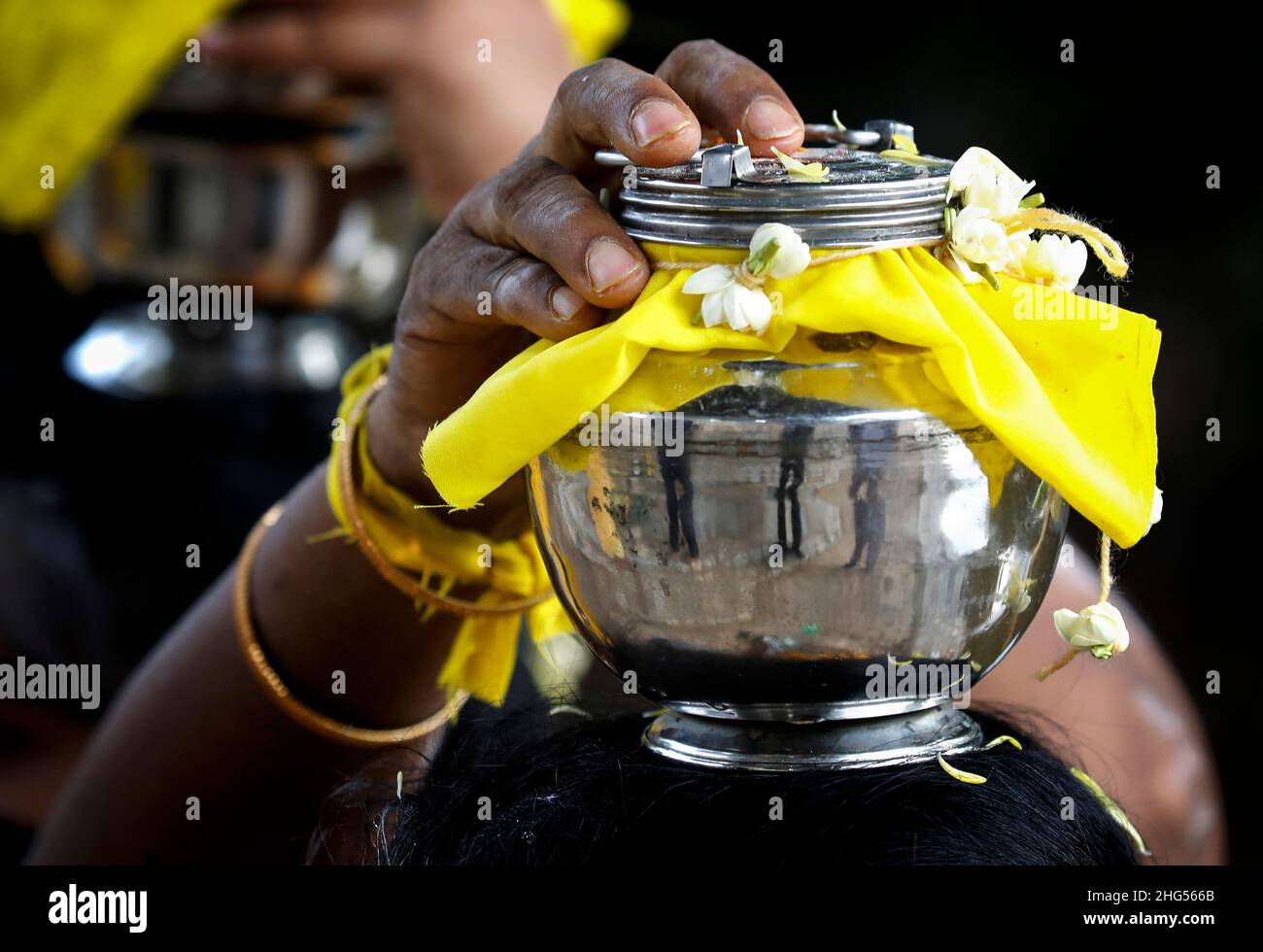 Kuala Lumpur, Malaysia. 18th Jan, 2022. A Hindu devotee carries a milk ...