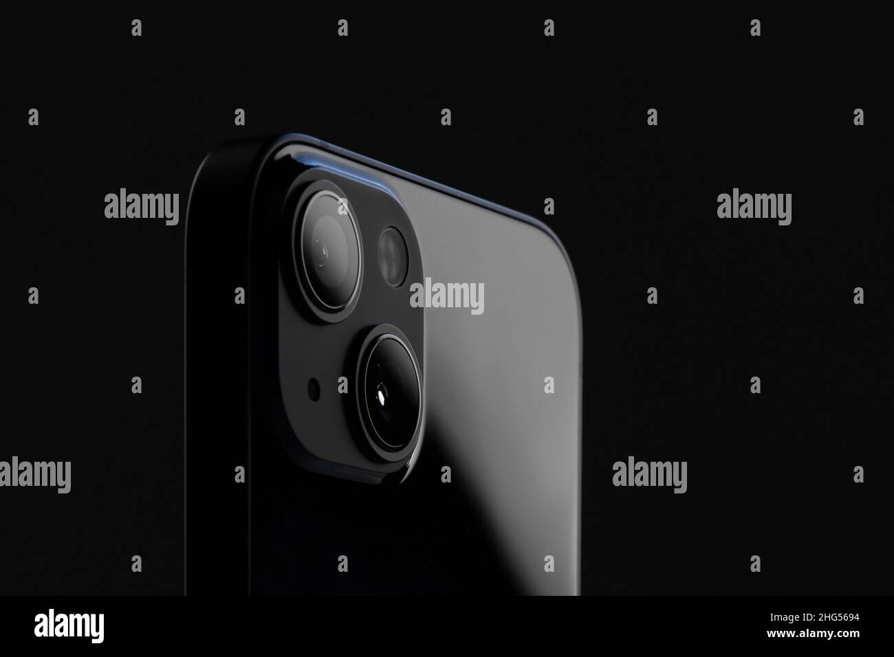 black modern rectangular smartphone with two photo modules on a black ...